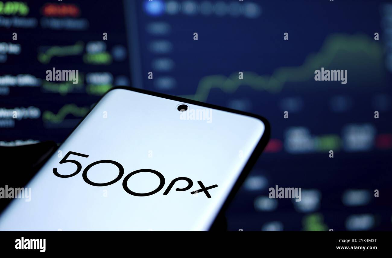 500px logo is displayed on smartphone.500px is a global online photo ...