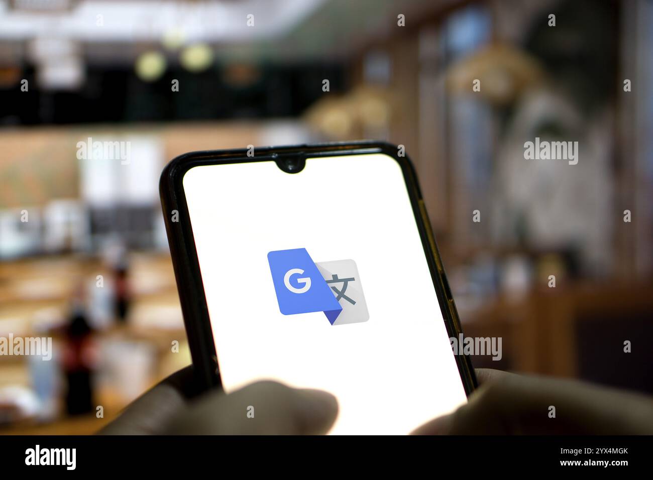 Smartphone showing Google Translate application logo on an a screen ...