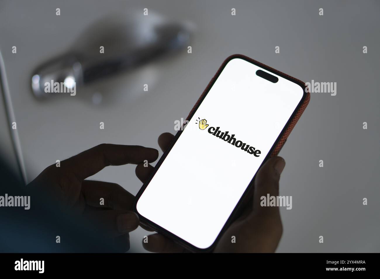 Clubhouse logo is displayed on smartphone. Clubhouse is a social audio ...