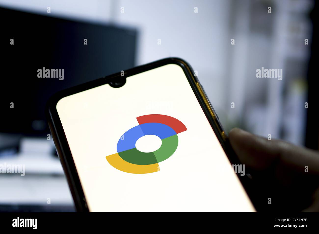 Google find my device logo is displayed on smartphone and background ...