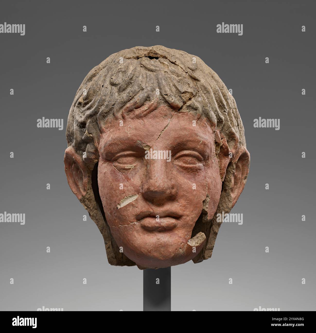 Votive Head of a Young Man, 200-150 B.C. Additional Info: This hollow ...