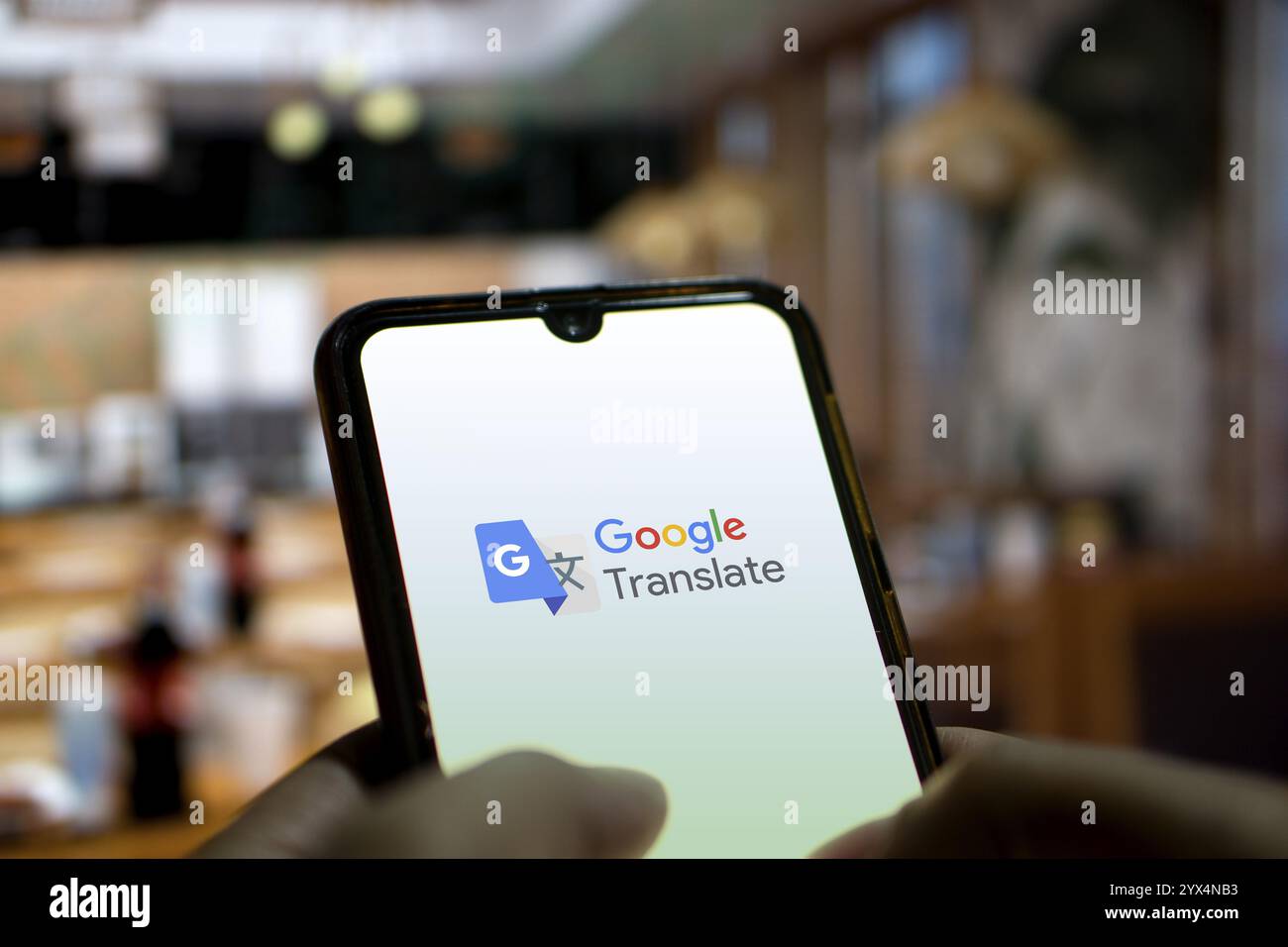 Smartphone showing Google Translate application logo on an a screen ...