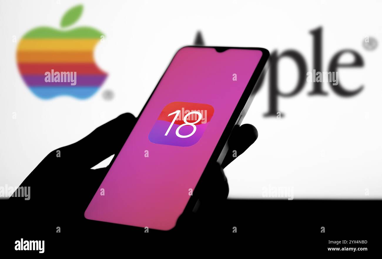 Apple IOS 18 icon on smartphone and Apple logo on the background Stock ...