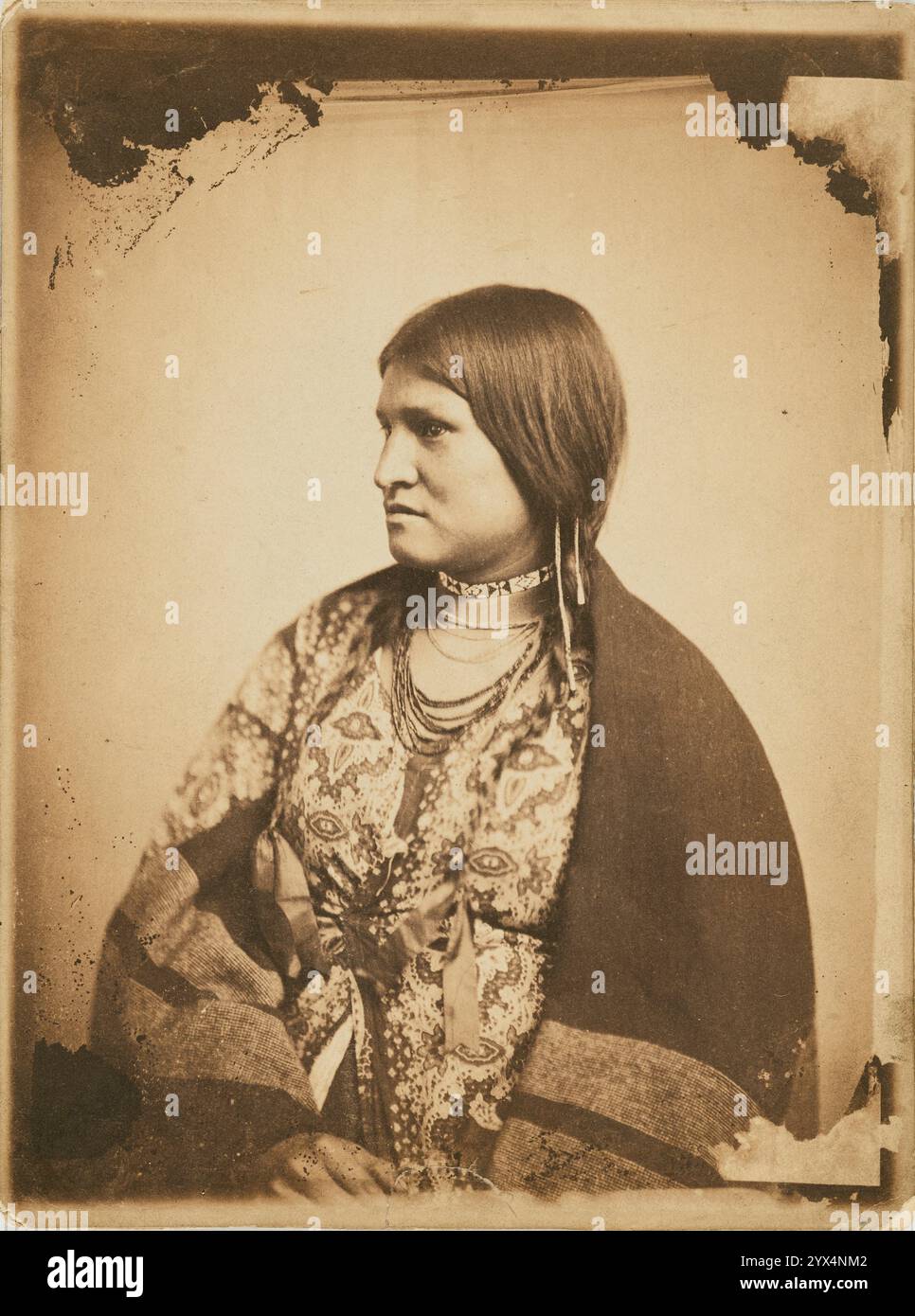 Portrait of a Dakota Sitter, about 1862-1864. Three-quarter portrait of ...