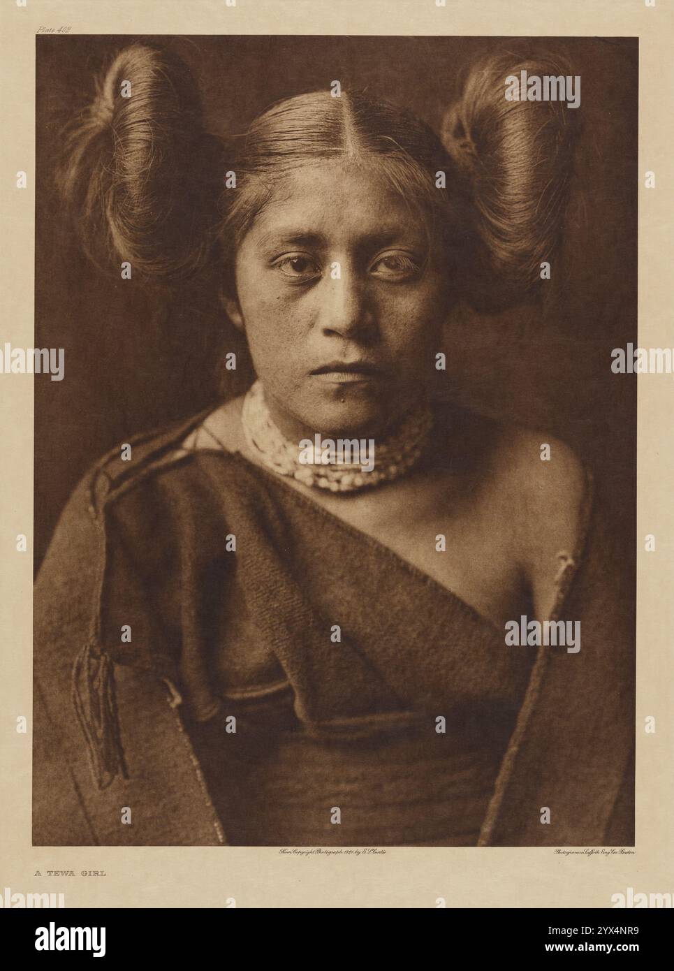 A Tewa Girl, 1921. Portrait of young Native American woman with squash ...