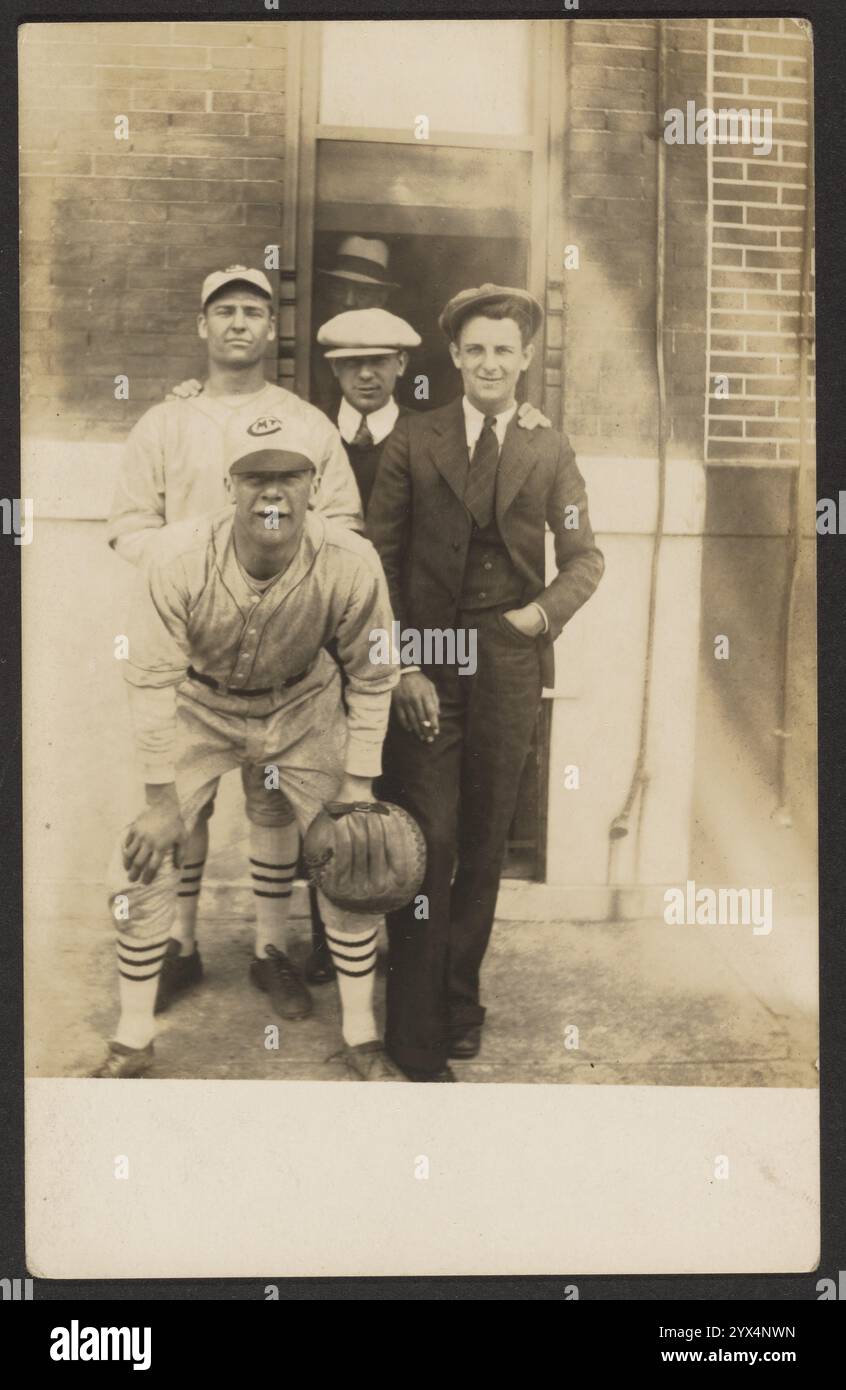 Five men, two in baseball uniforms, about 1926. Portrait of five men ...
