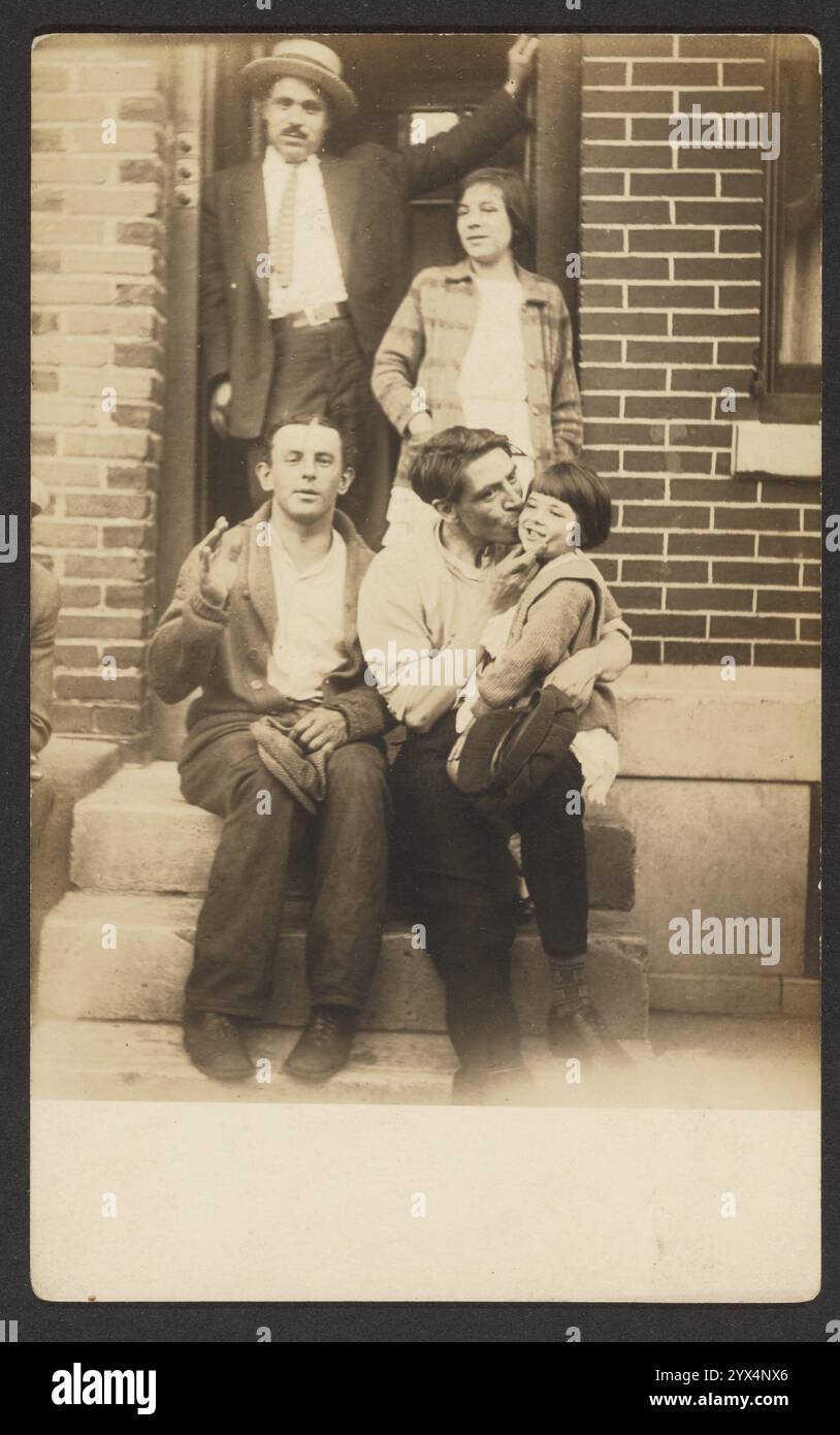 Family on Stoop, about 1926. Portrait of three men and two girls in the ...