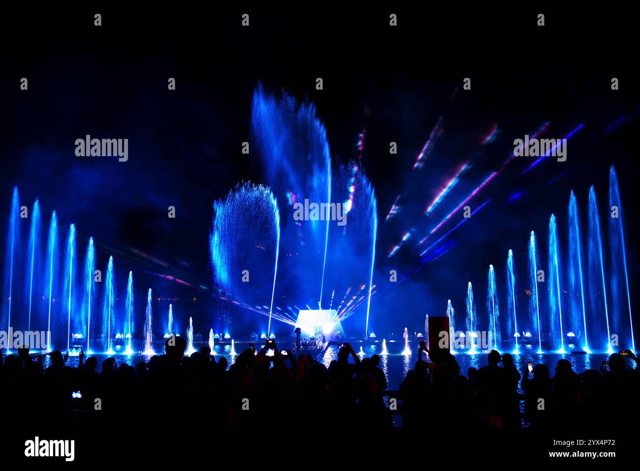 Mesmerizing Blue Laser Light Show with Dancing Water Fountains Under ...