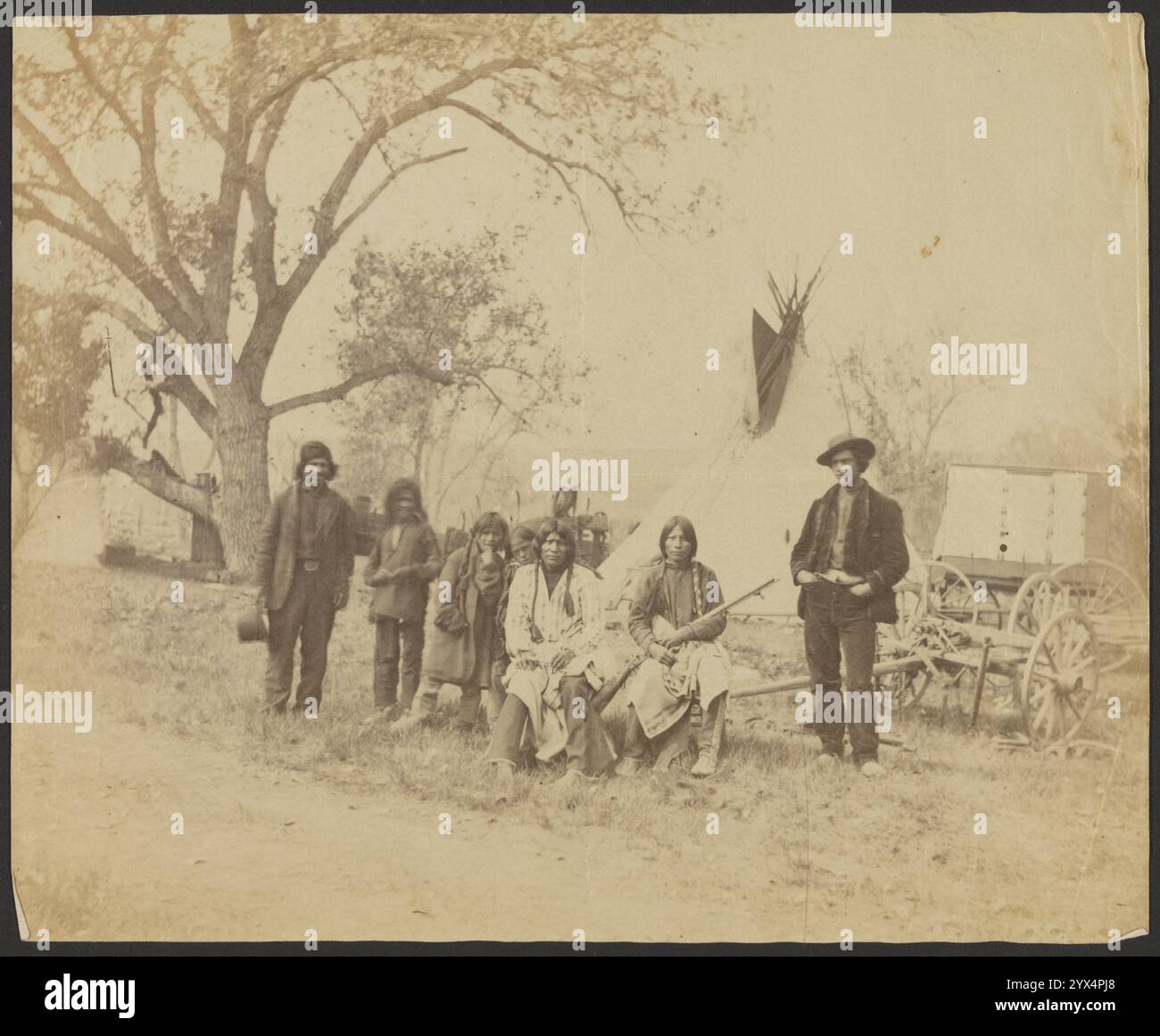Group portrait of Native Americans, about 1865-1870. A group of Native ...