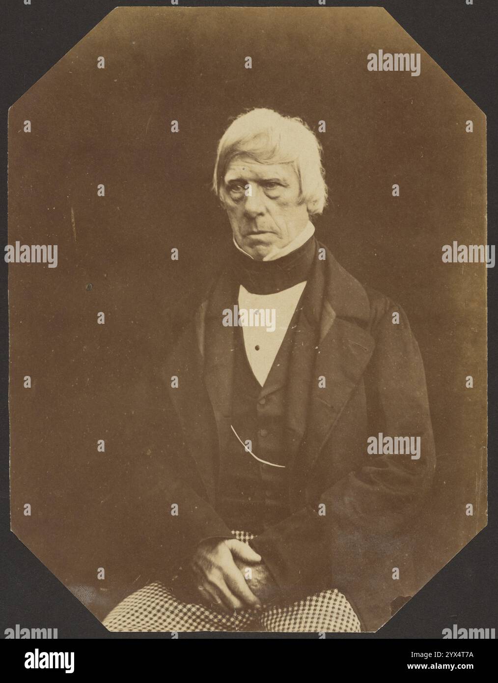 Seated figure in formal attire hands hi-res stock photography and ...