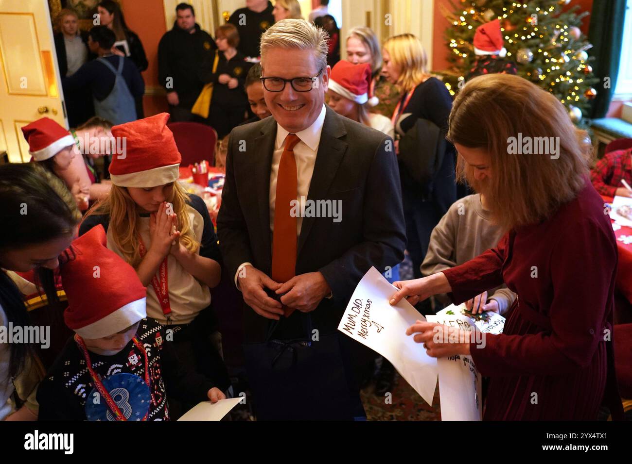 Prime Minister Sir Keir Starmer interacts with children as he and his ...