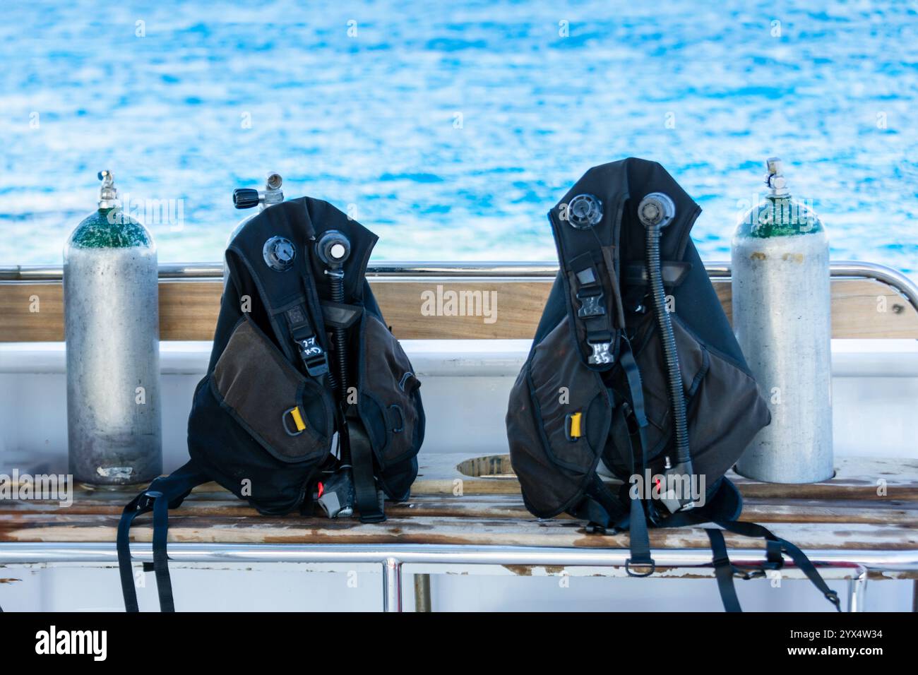 Concept of scuba diving with tank and equipment lying on a boat over ...