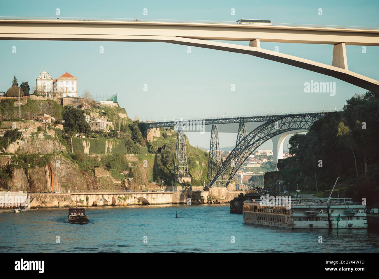 Scenic telephoto view of two iconic bridges in Porto, Portugal ...