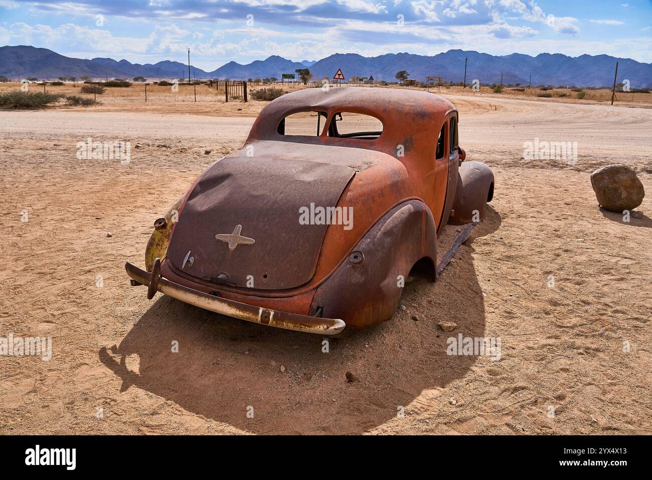 Wrecked oldtimer cars and other vehicles in Solitaire, Namibia Stock ...