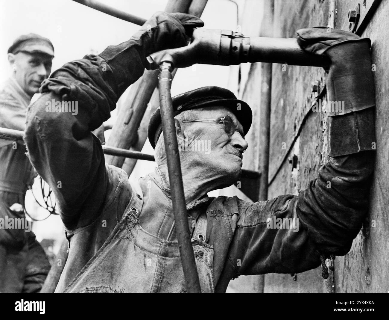 1949 Hamburg harbor riveter attaches ship iron plates - Deutsche Werft ...