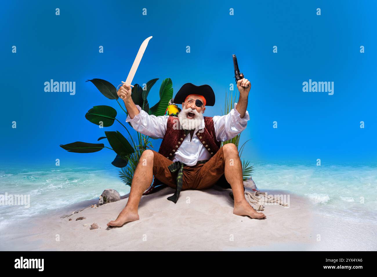 Bearded senior pirate captain striking adventurous pose on tropical ...