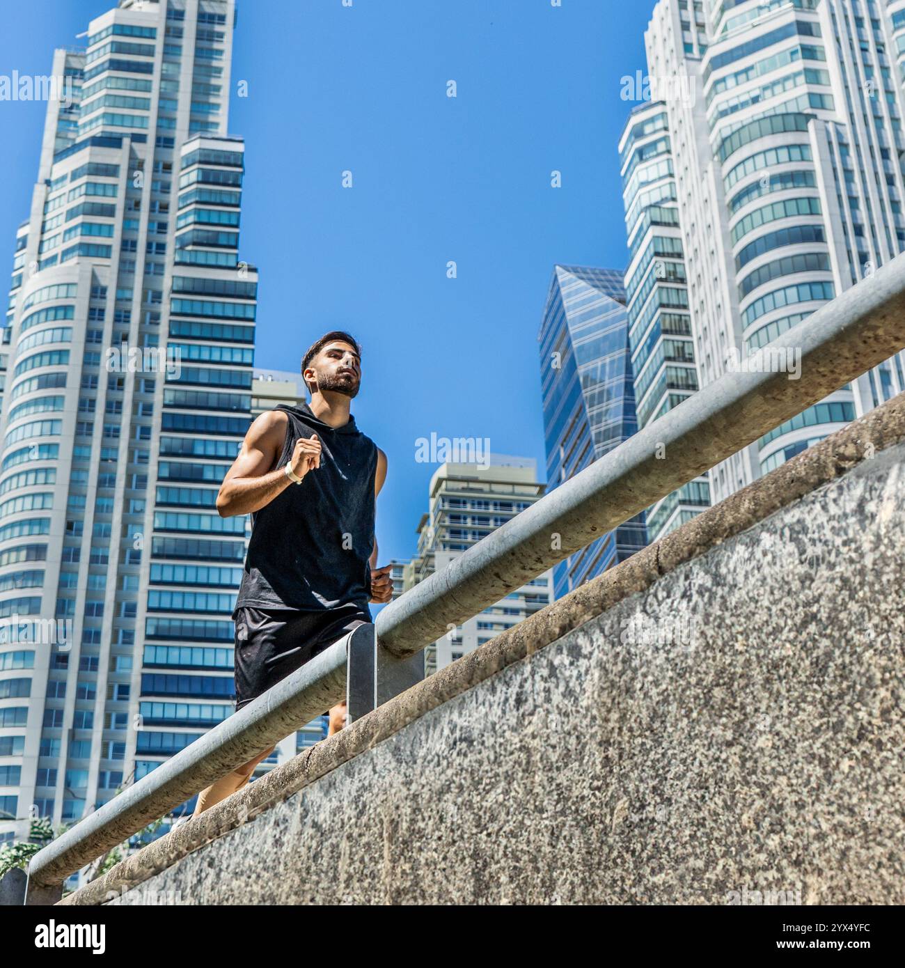 Young latino man engaging in hi-res stock photography and images - Alamy