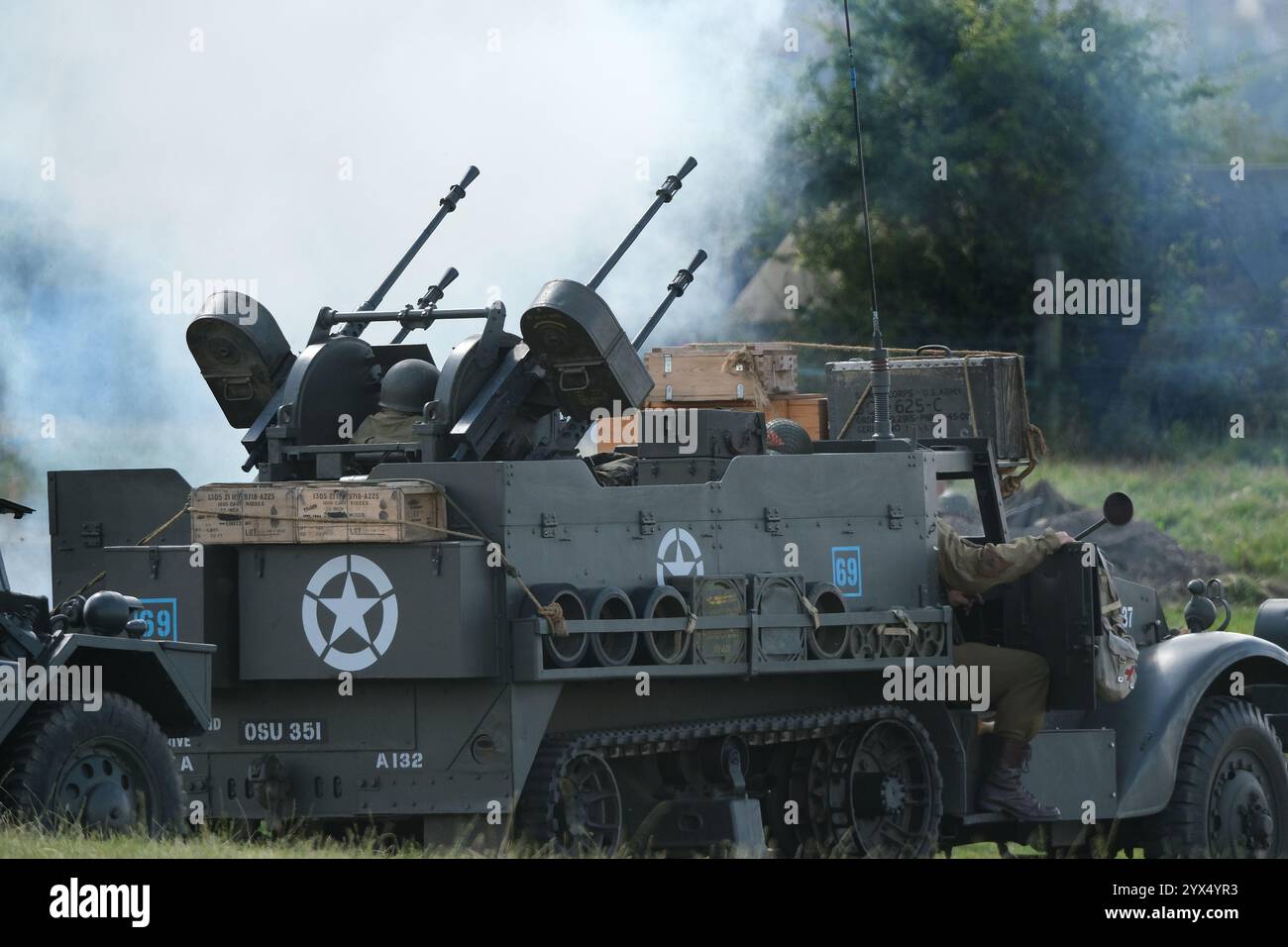 Reenactment battle of Normandy. British and American forces attack ...