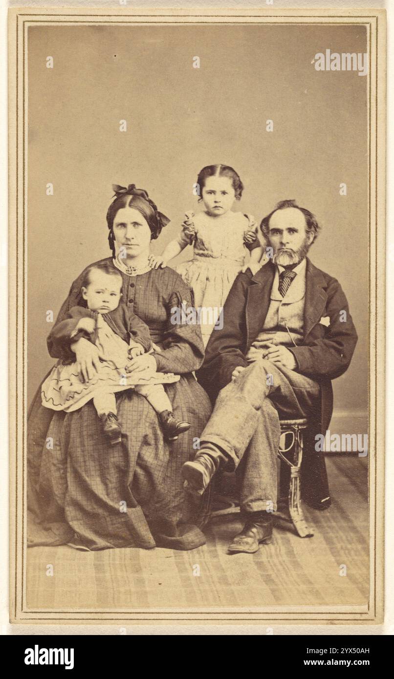 Family portrait: mother, father and two children, 1870s Stock Photo - Alamy