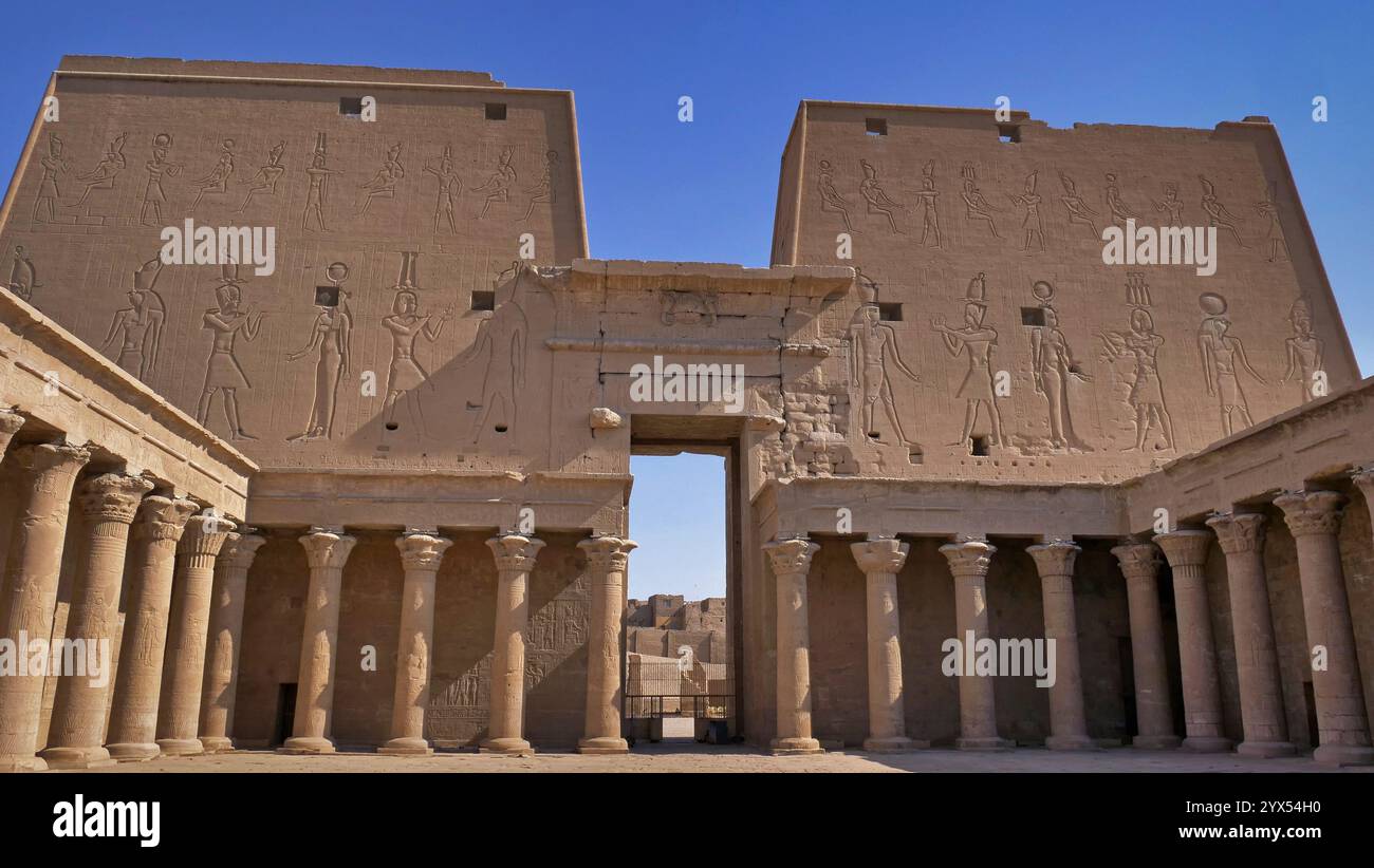 Pylon, columns and bas-relief of The Horus Temple in Edfu, Egypt Stock ...