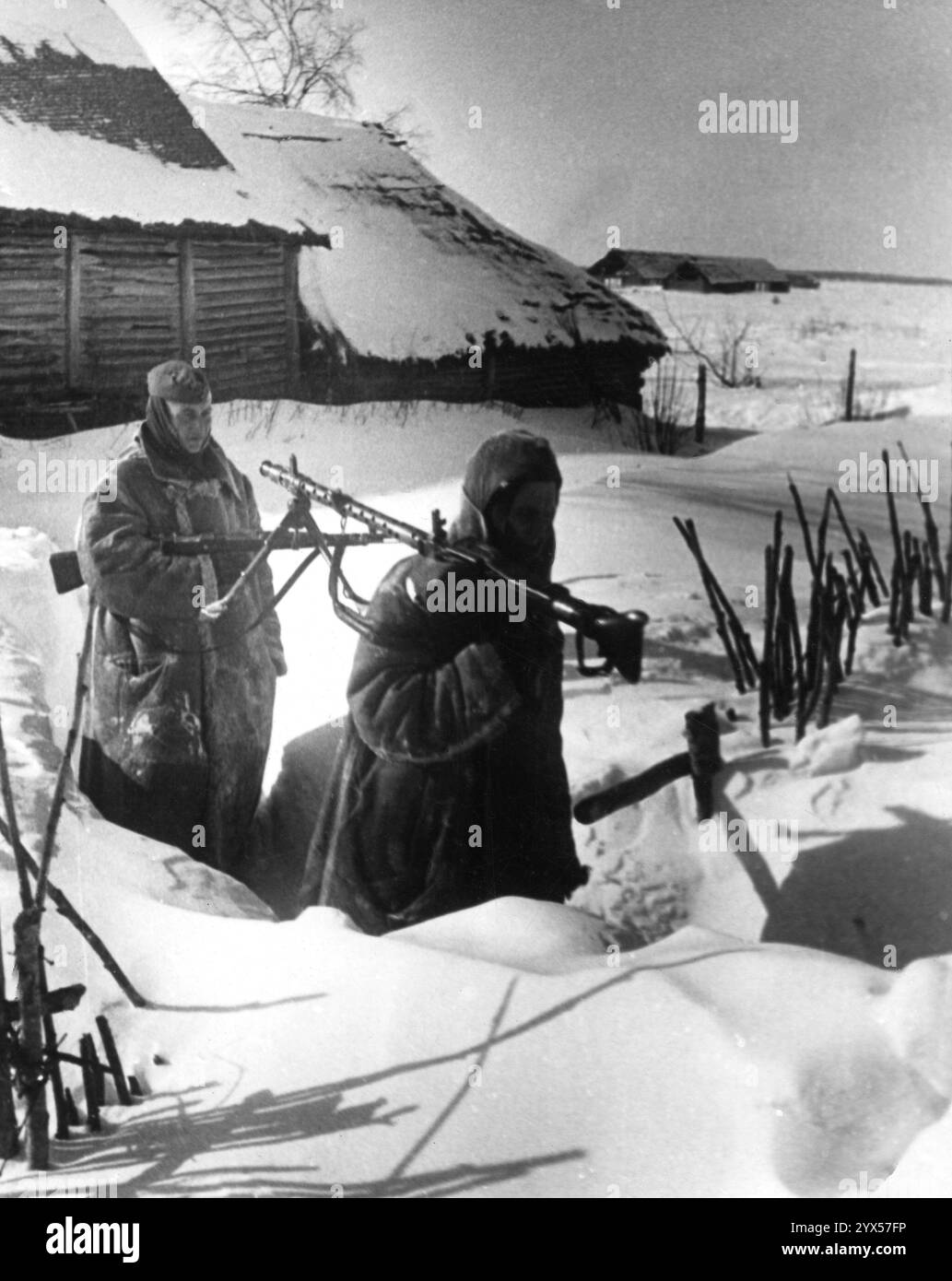 Soldiers on their way to the position in February 1942, taking up ...