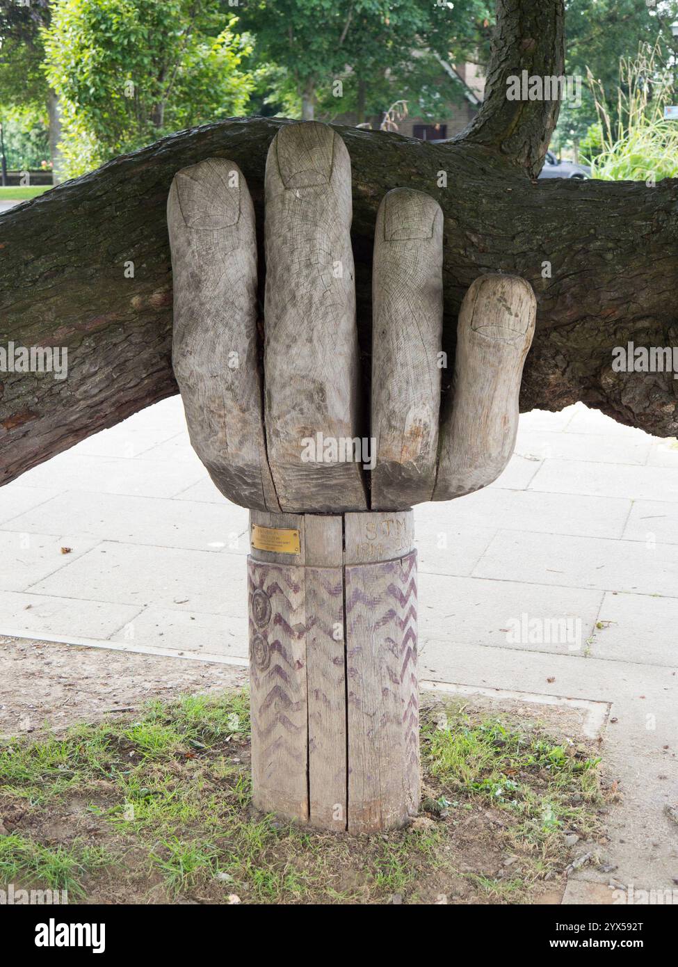 Hand sculpture is a creative artistic solution supporting a lateral ...