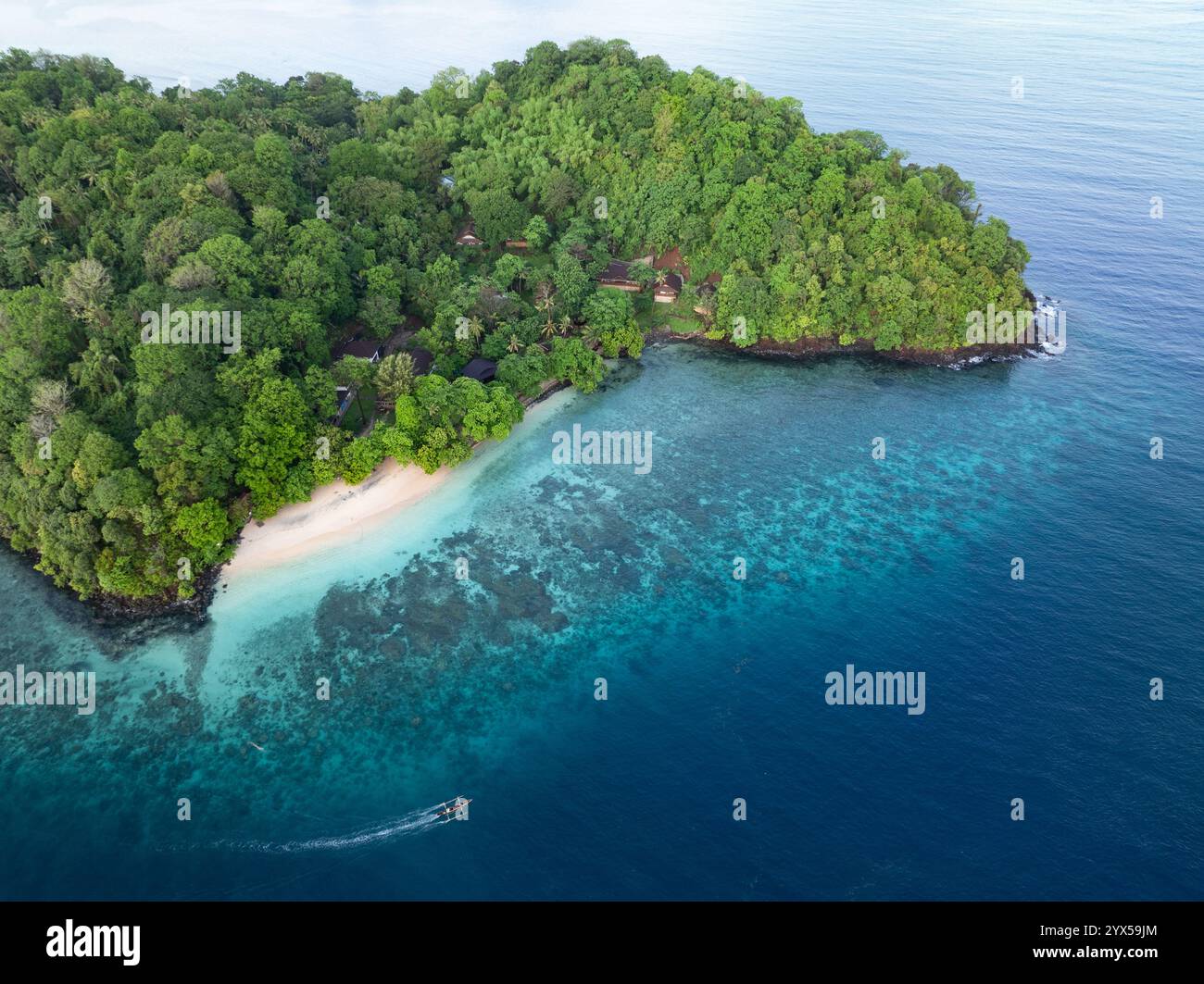 Covered by rainforest, the tropical island of Bangka, just north of ...