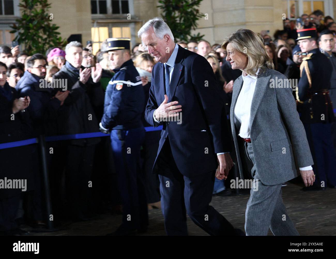 French outgoing Prime Minister Michel Barnier and Isabelle Altmayer ...