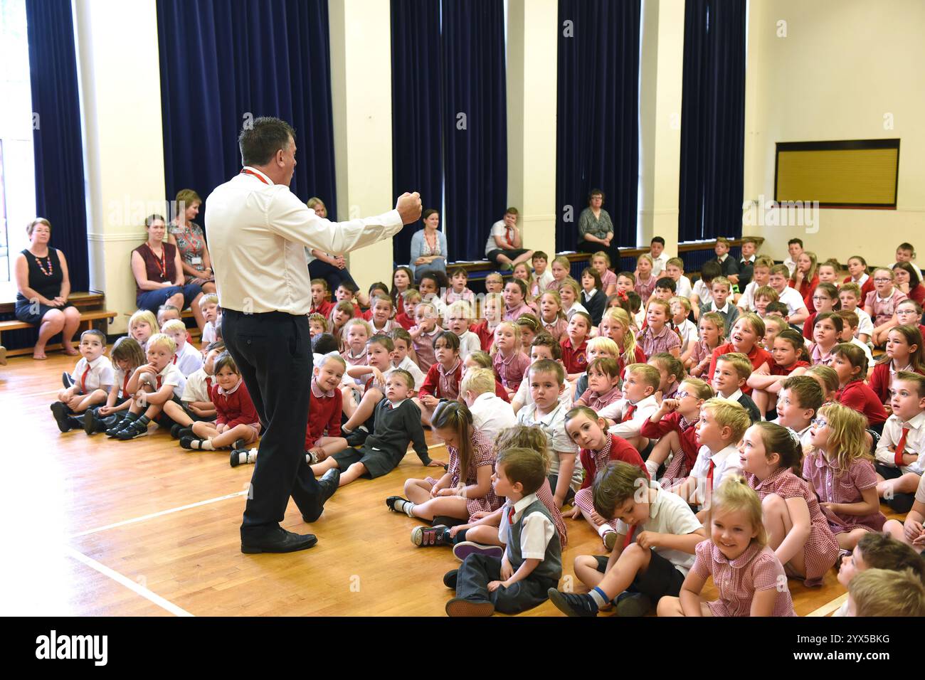 Headteacher Colin Jackson inspiring puplils during School assembly at ...