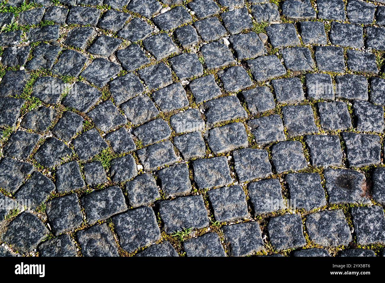 Granite Cubes Paving a Historic Town Street, Showcasing Durable ...