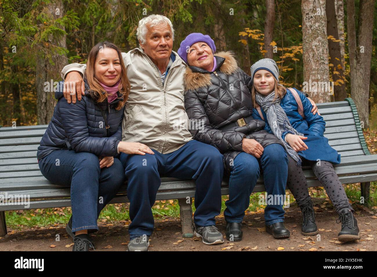 Grandmother grandchild sitting on bench hi-res stock photography and ...