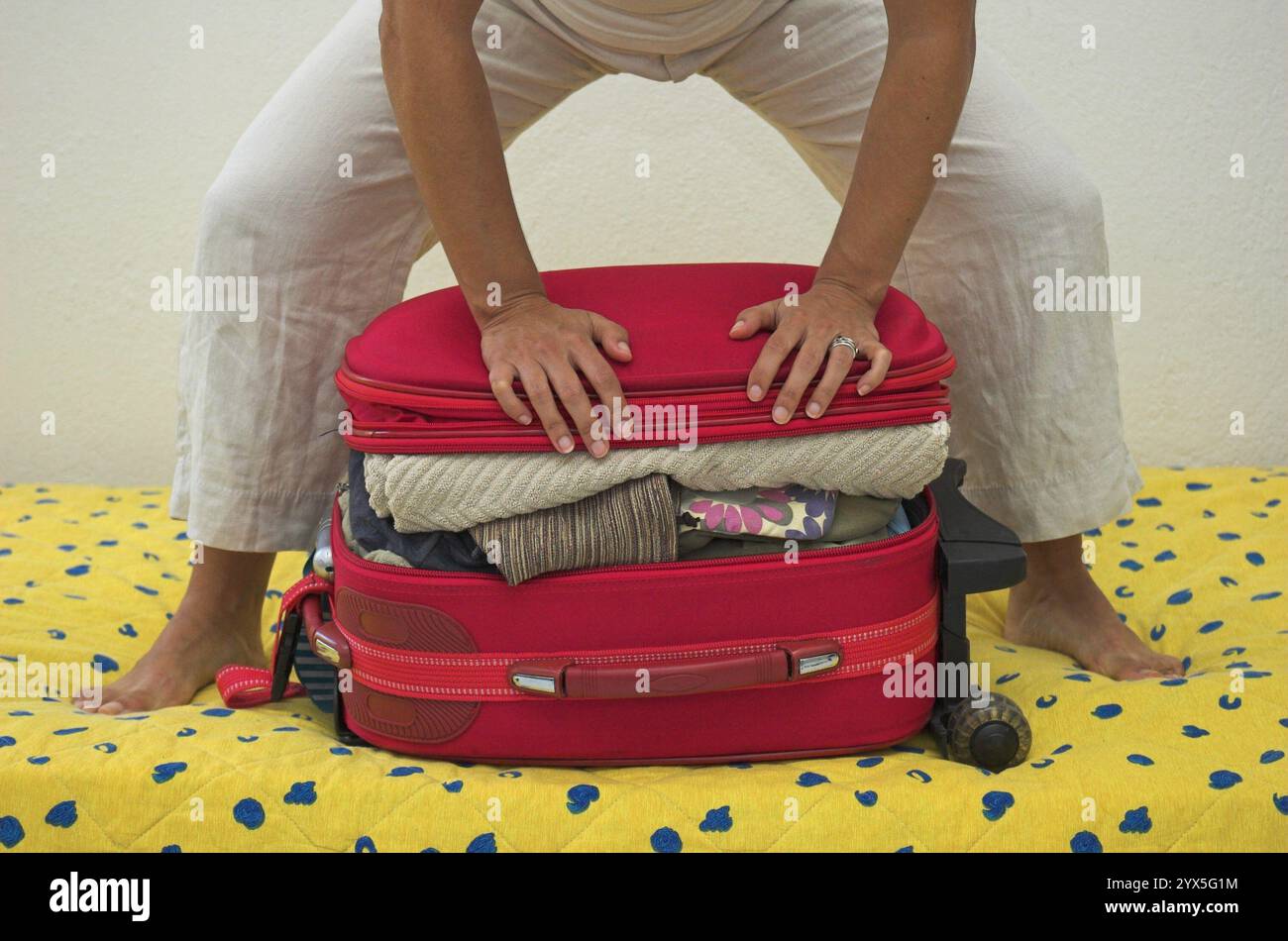 Squeeze into clothes woman hi-res stock photography and images - Alamy