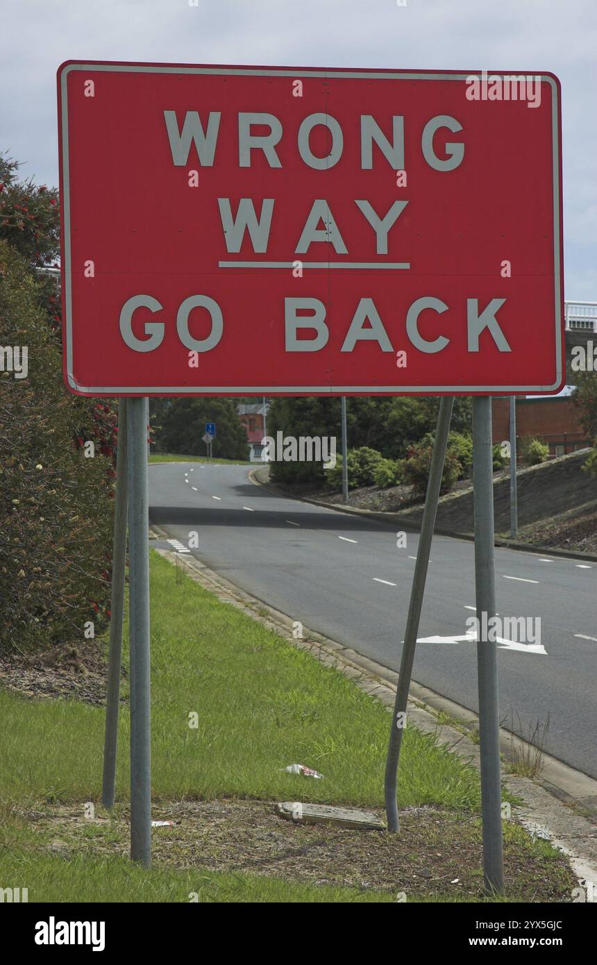 Large red warning sign wrong way go back on one way street to prevent ...