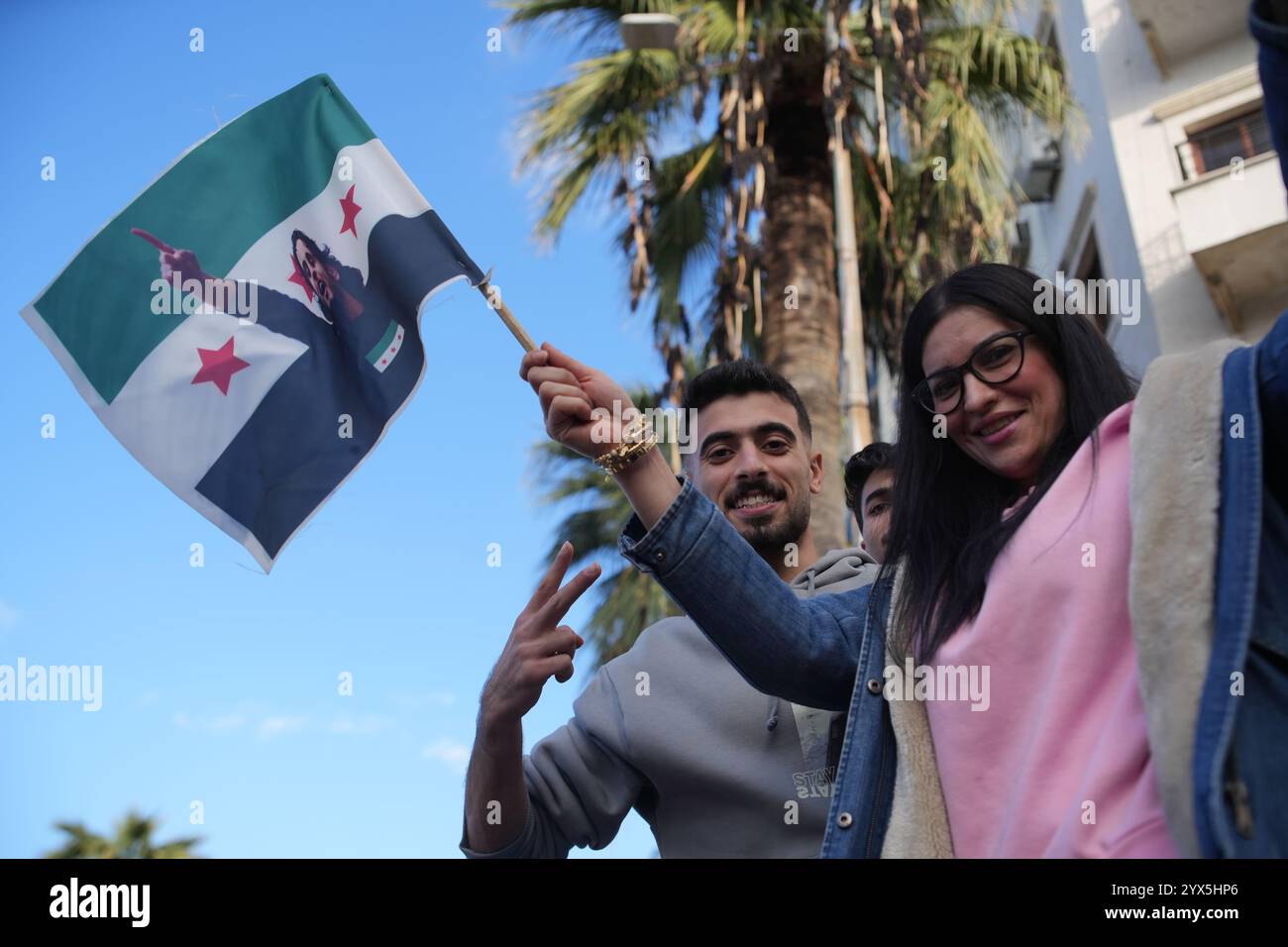 People celebrate in Latakia, Syria after the fall of Syria's Bashar ...