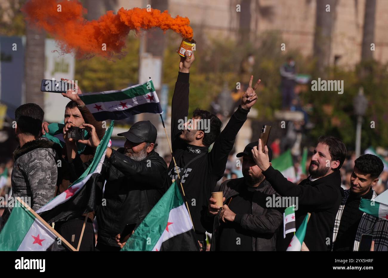 People celebrate in Latakia, Syria after the fall of Syria's Bashar ...