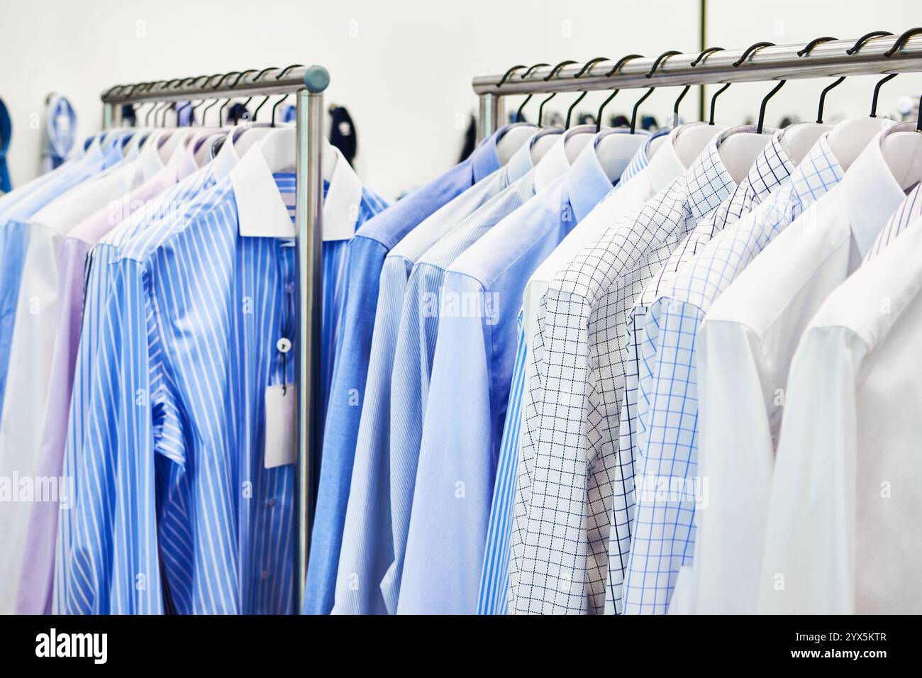 Men's shirts in the clothing store Stock Photo - Alamy