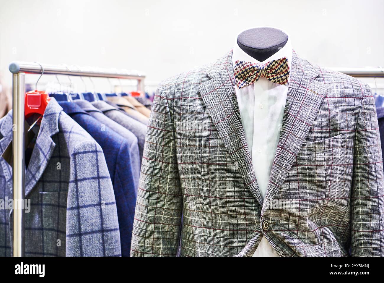Men's suits in the clothing store Stock Photo - Alamy
