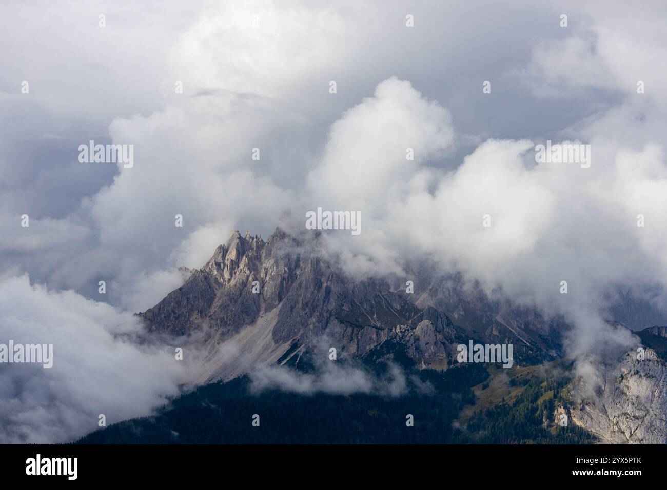 Above the clouds mountain landscape in the Dolomiti Alps, Italy. Rocky ...