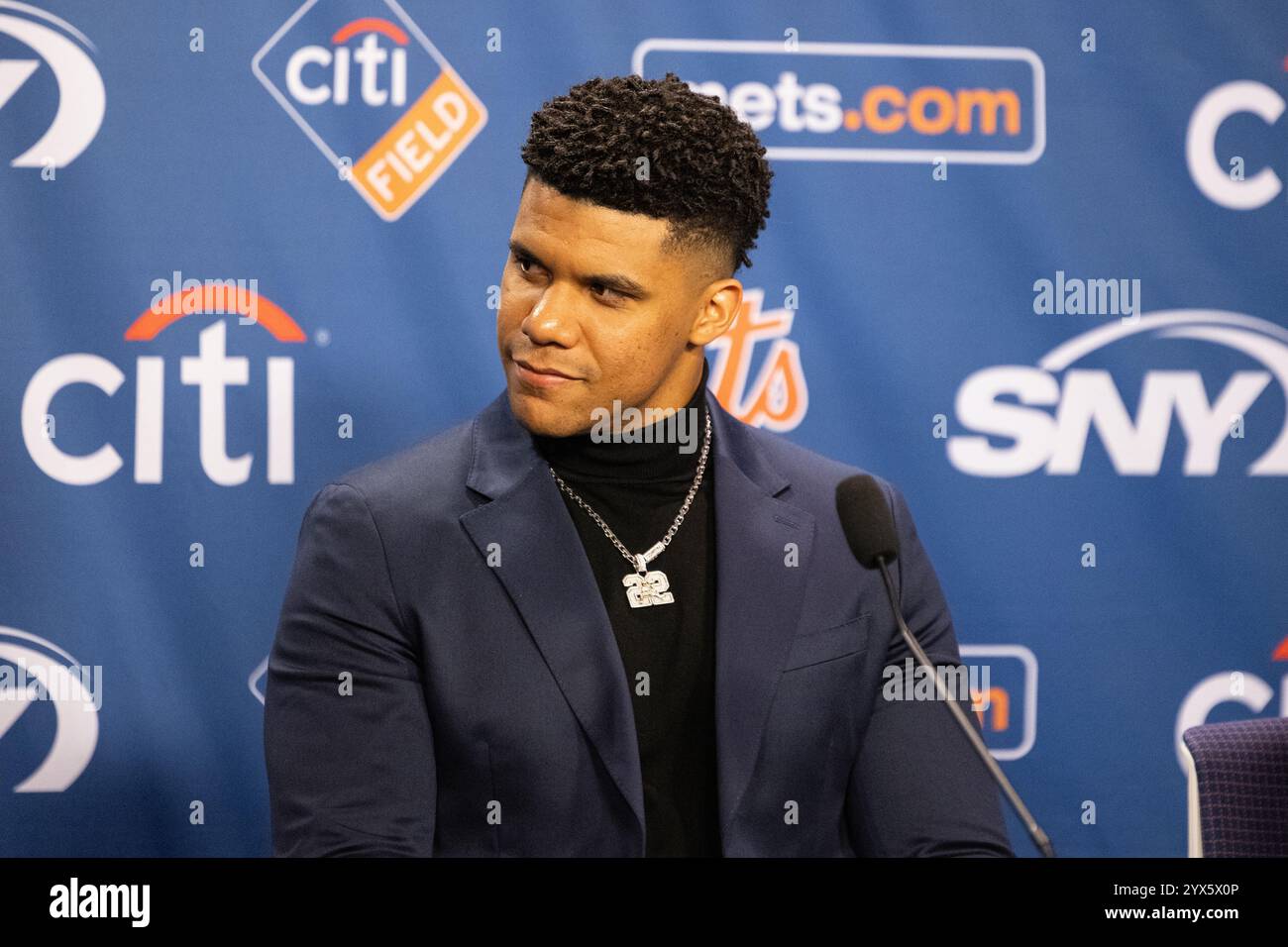 New York Mets outfielder Juan Soto #22 speaks to the media during a ...