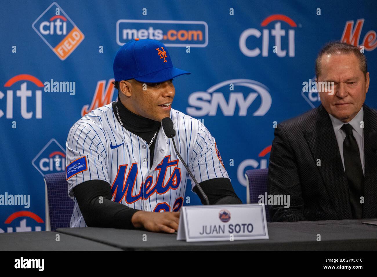 New York Mets outfielder Juan Soto #22 speaks to the media during a ...