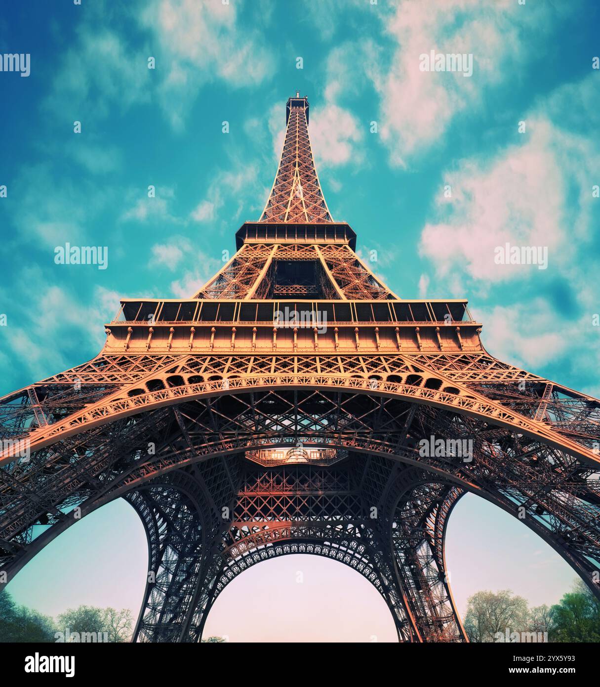 Low viewpoint of the Eiffel Tower and cloudy sky, Paris, France Stock ...