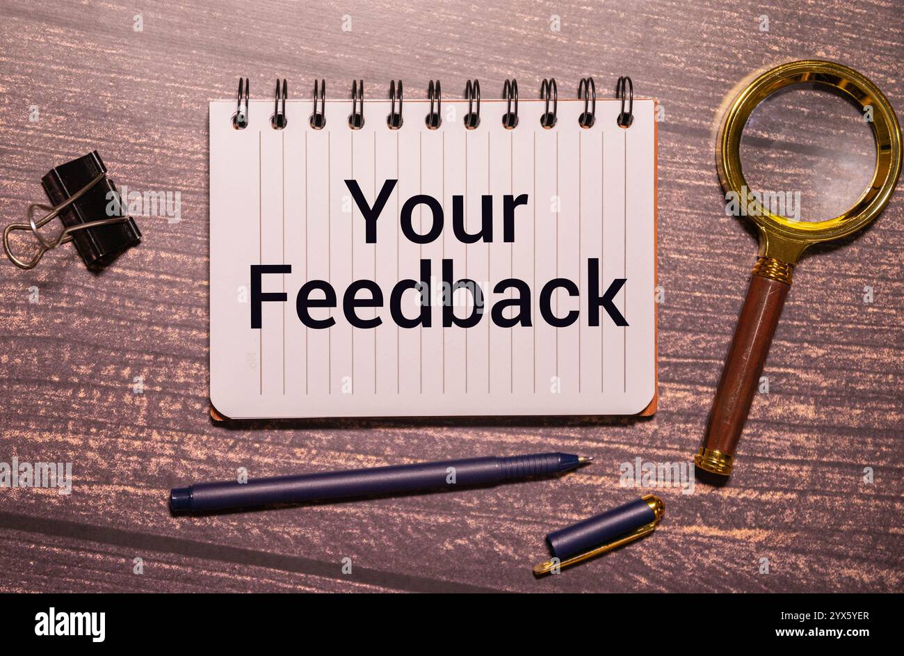 paper note with text We need your Help, pen and office tools, white ...