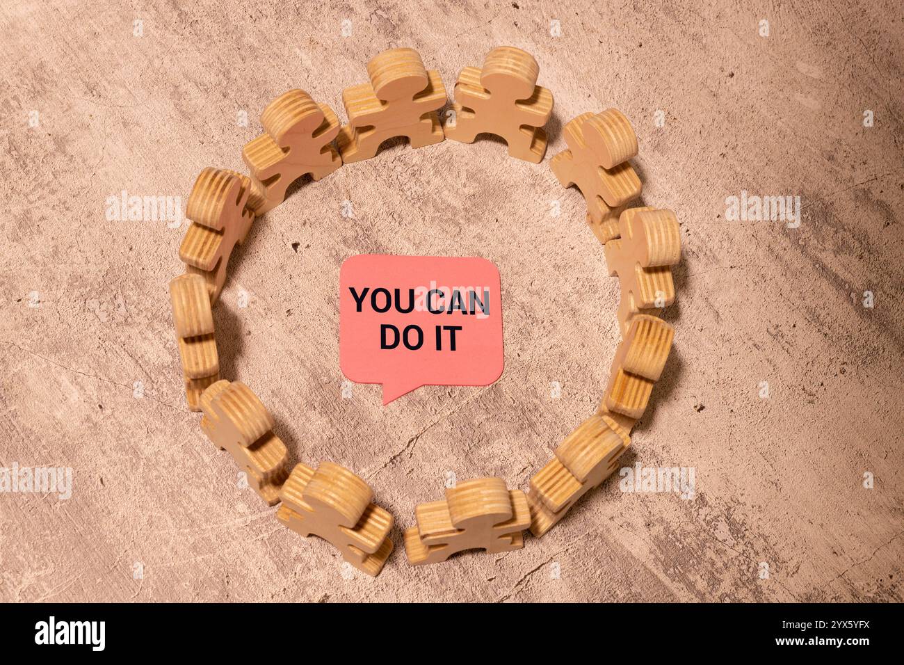 Top view of diverse professionals united in a hands-in huddle ...
