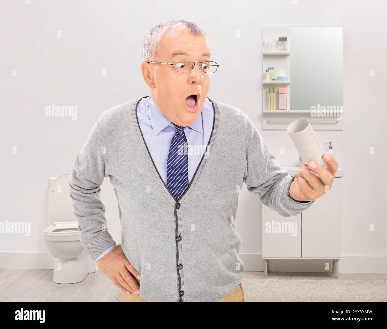 Confused man toilet paper hi-res stock photography and images - Alamy