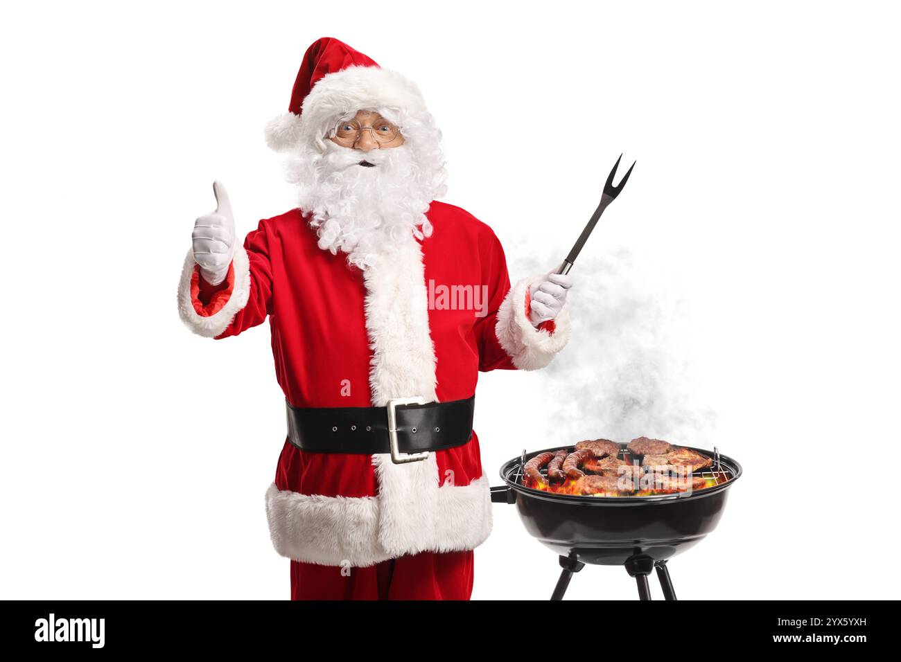 Santa claus cooking meat on a bbq and gesturing thumbs up isolated on ...