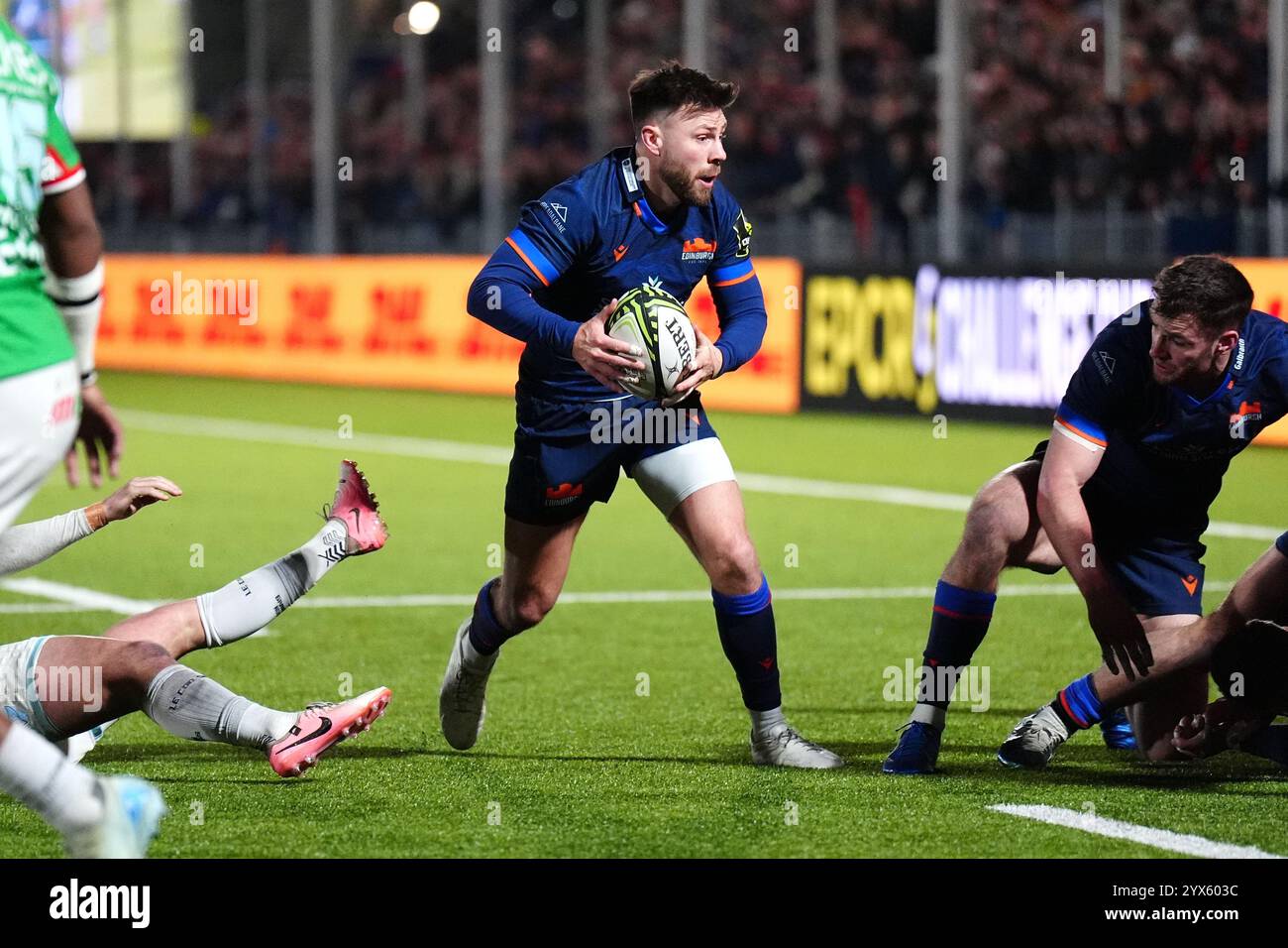 Edinburgh Rugby's Ali Price (centre) in action during the EPCR ...
