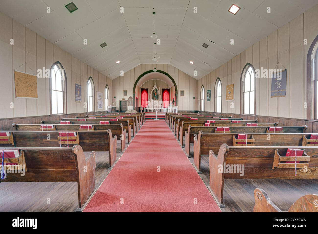 Pews and stained glass windows in church Stock Photo - Alamy
