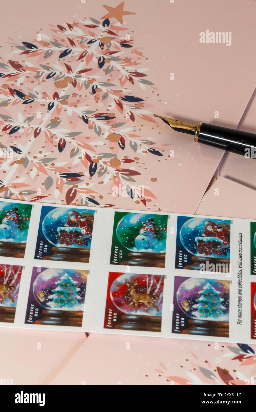 Still life of Christmas cards and stamps during the December holiday ...