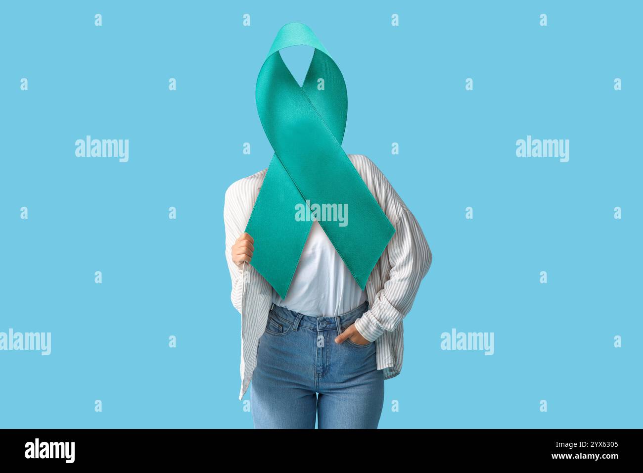 Woman with awareness ribbon instead of head on light blue background ...
