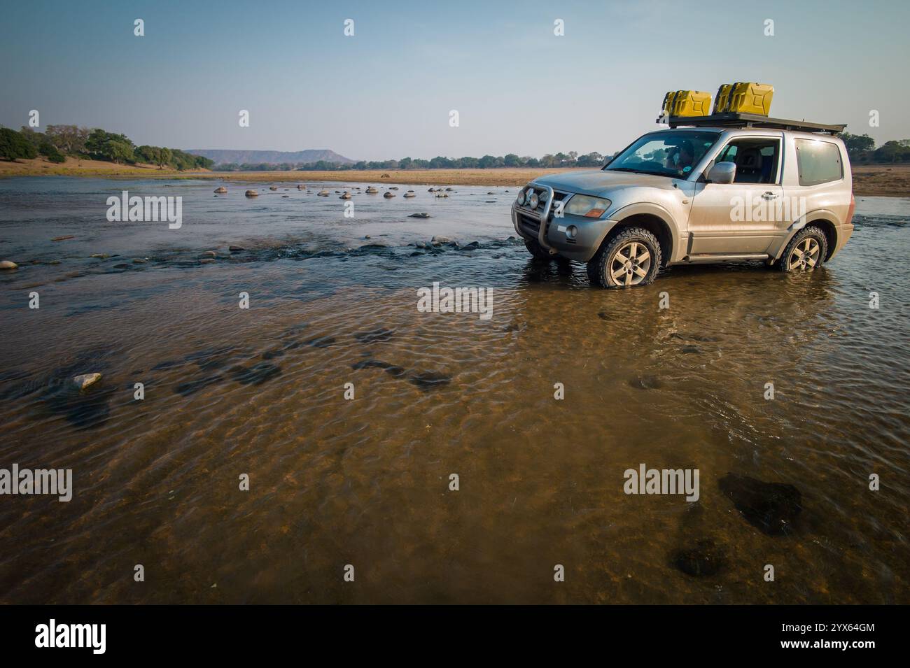 Driving acorss the Runde River at Fishan's Crossing on a self-drive ...